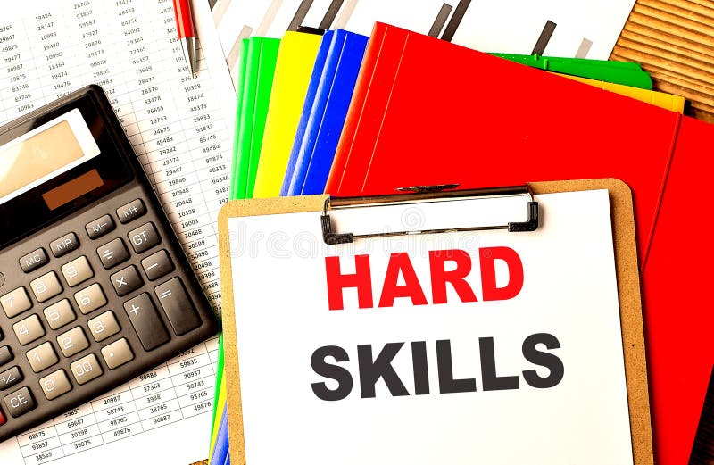 HARD SKILLS. Text Written on Paper Clipboard with Chart and Calculator ...