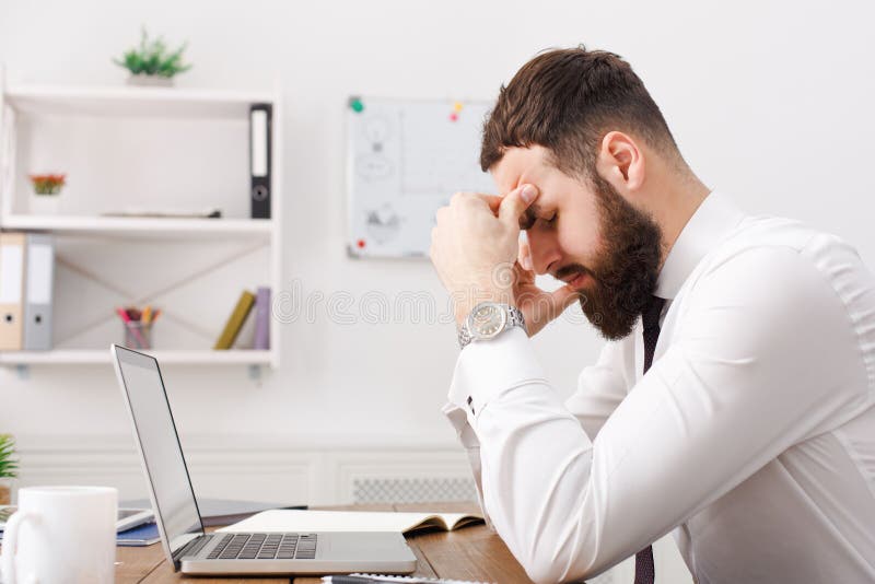 Young Exhausted Businessman Thinking about Solution in White Office ...