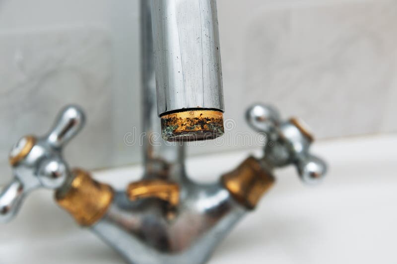 Hard Water Deposit and Rust on Tap in the Bathroom Stock Photo - Image ...