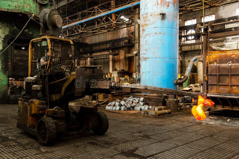 Hard work in a factory stock image. Image of founder - 46883531