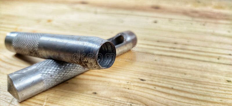 Hard Work Hole Punch stock image. Image of leather, work - 231308465