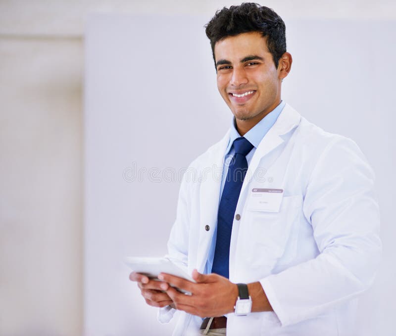 Hard at Work in the Lab. Portrait of a Smiling Lab Technician Using a ...