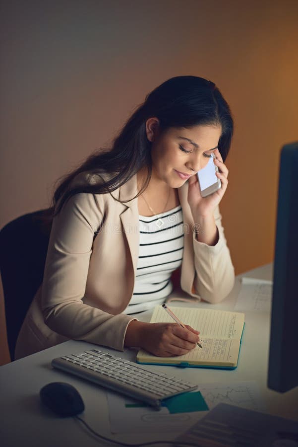 Hard Work Makes All the Difference. a Young Businesswoman Using a ...