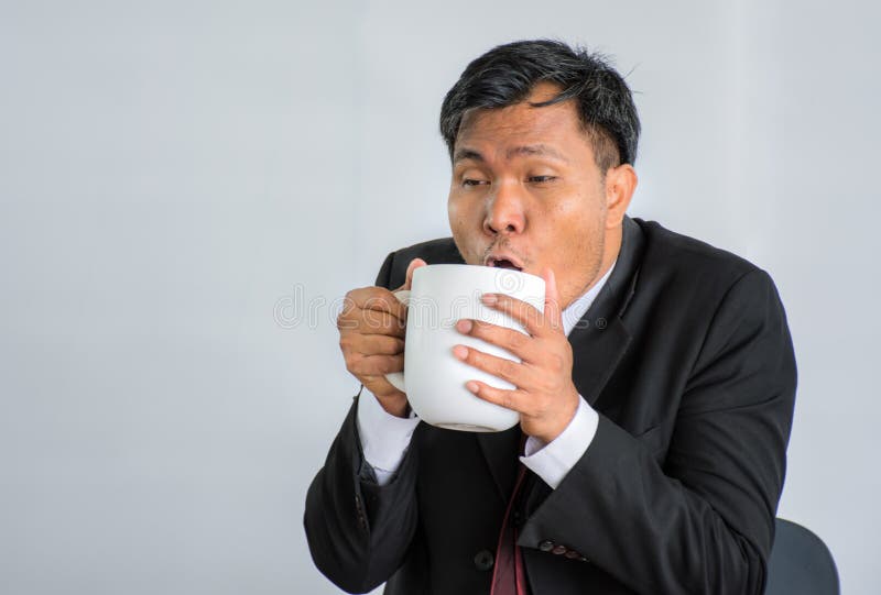 Hard Working Businessman Fatigue Drinking Coffee /Isolate Stock Photo ...
