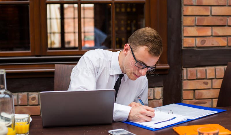 Hard Working Businessman in Restaurant. Stock Image - Image of deadline ...