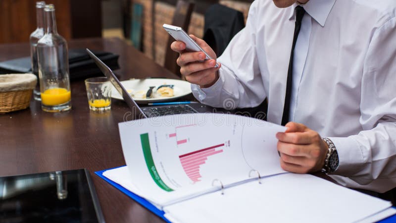 Hard Working Businessman in Restaurant. Stock Image - Image of juice ...