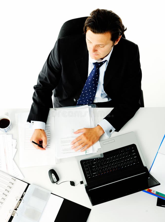 Hard working man at desk stock image. Image of support - 22774821