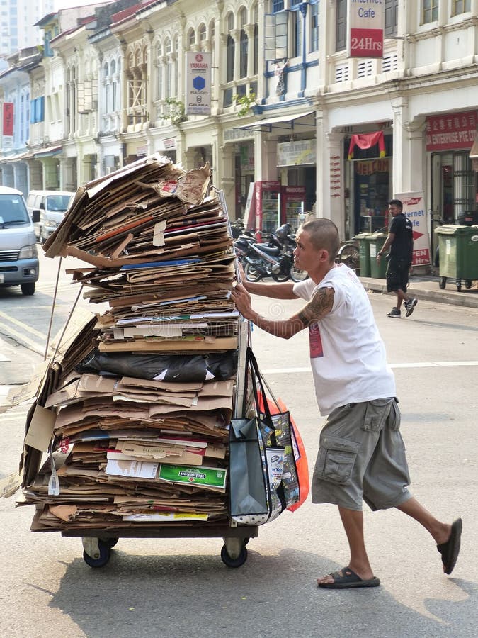 Hard Working Man Pushing a Cart Full of Carton Boxes in Shanghai ...