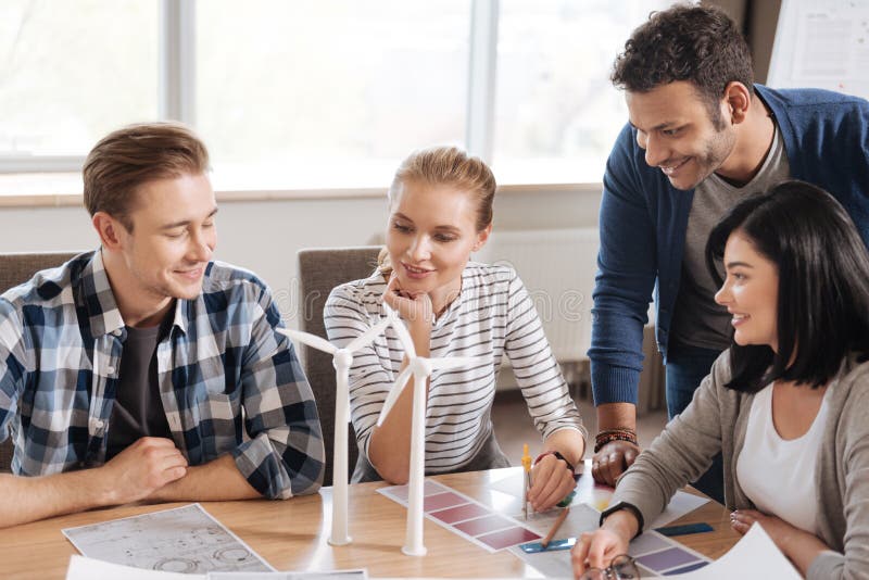 Hard Working Nice Engineers Looking at the Windmill Models Stock Photo ...
