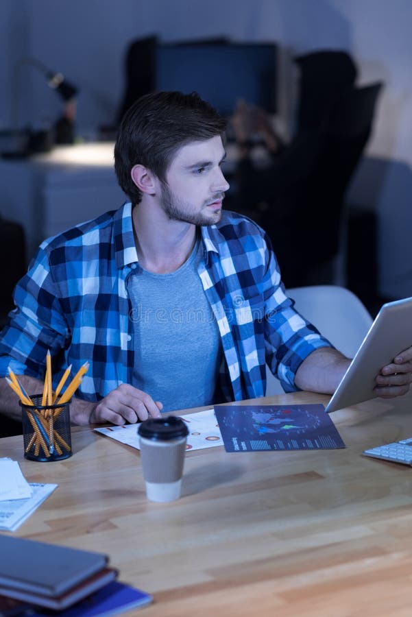 Hard Working Nice Man Looking at the Graphics Stock Image - Image of ...
