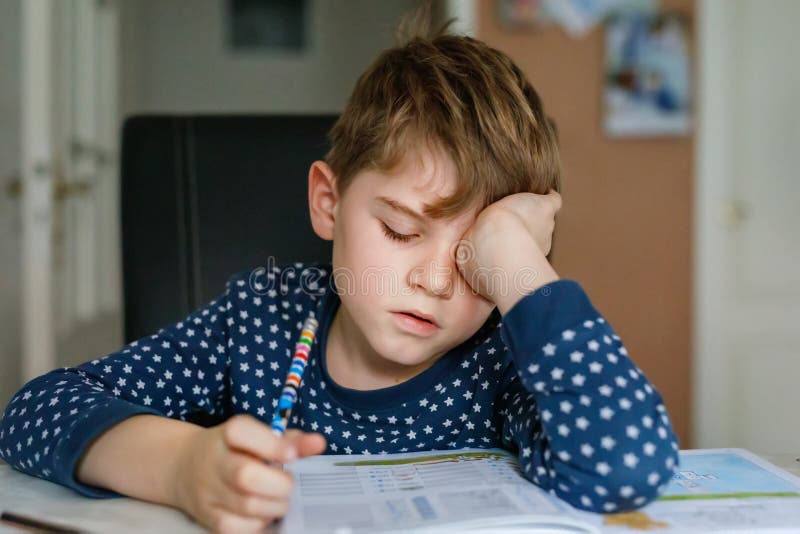 Hard-working Happy School Kid Boy Making Homework during Quarantine ...