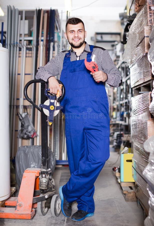 Worker Proudly Shows His Workplace Stock Photo - Image of caucasian ...