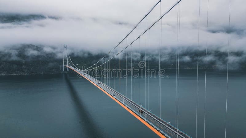 Hardanger Bridge Stretches Across a Vast Expanse of Ocean with Clouds ...