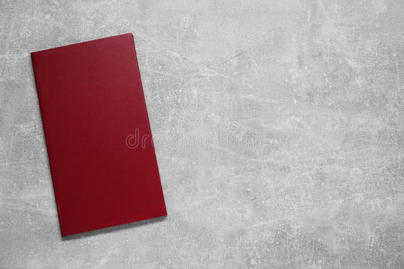 Hardcover Book on Grey Textured Table, Top View. Space for Text Stock ...