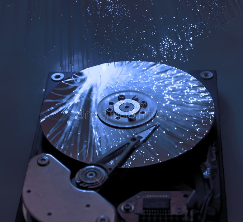 Harddisk with Fiber Optical Background Stock Image - Image of computer ...