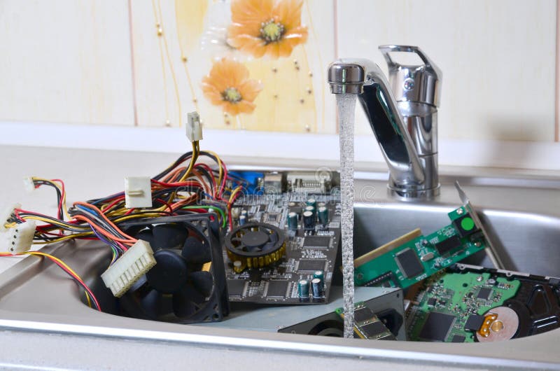 Personal Computer Cleaning Concept. Hardware in Kitchen Sink Stock ...