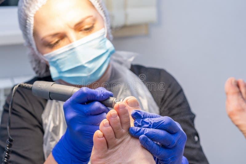 Hardware Pedicure, Sanding the Foot with an Abrasive Disc Stock Image ...