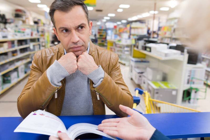 Hardware Store Assistant Helping Customer Stock Image - Image of ...