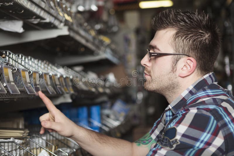 Hardware Store Client Do Some Shopping for His Stock Photo - Image of ...