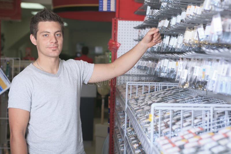 Hardware store employee stock image. Image of market - 51247377