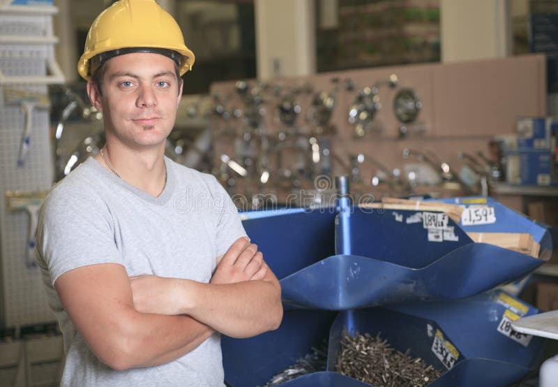 Hardware store employee stock image. Image of market - 51247377