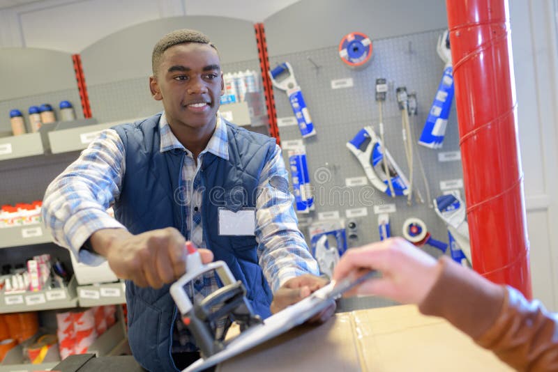 Store Employee with Tablet Computer at Supermarket Stock Photo - Image ...