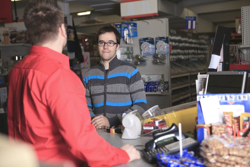 Hardware store employee stock photo. Image of customer - 50822428