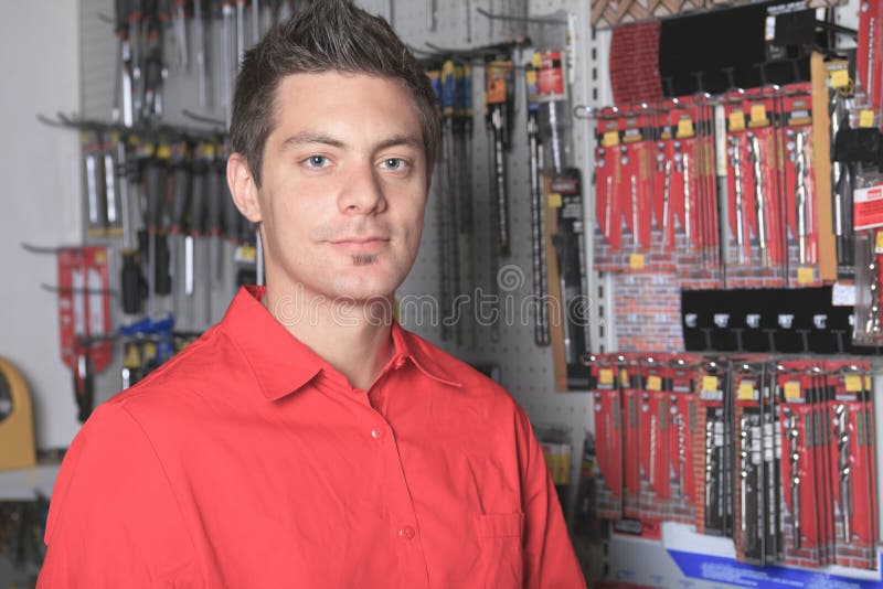 Hardware store employee stock image. Image of market - 51247695