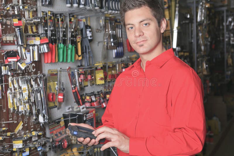 Hardware store employee stock image. Image of market - 51247377