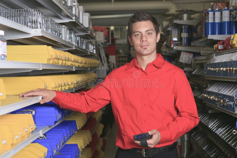 Hardware store employee stock photo. Image of customer - 50822428