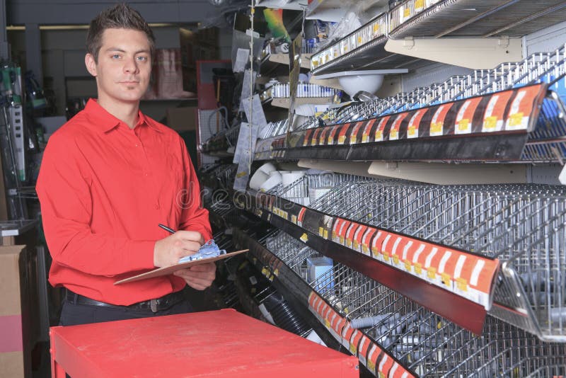 Hardware store employee stock photo. Image of retail - 51247642