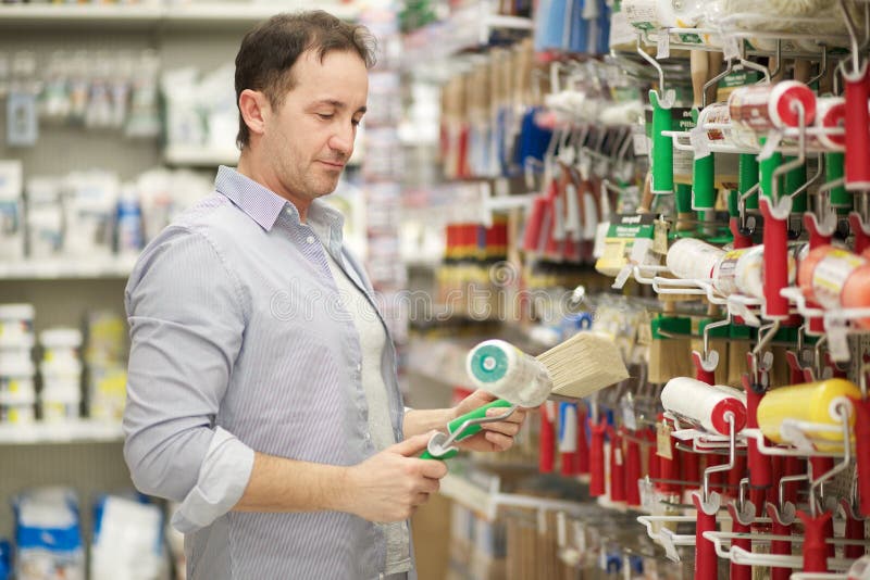 Hardware store stock image. Image of paint, arms, choosing - 71862295