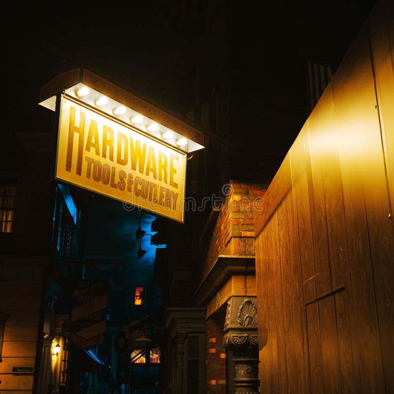 Hardware Tools and Cutlery Sign Illuminated at Night in Closeup ...