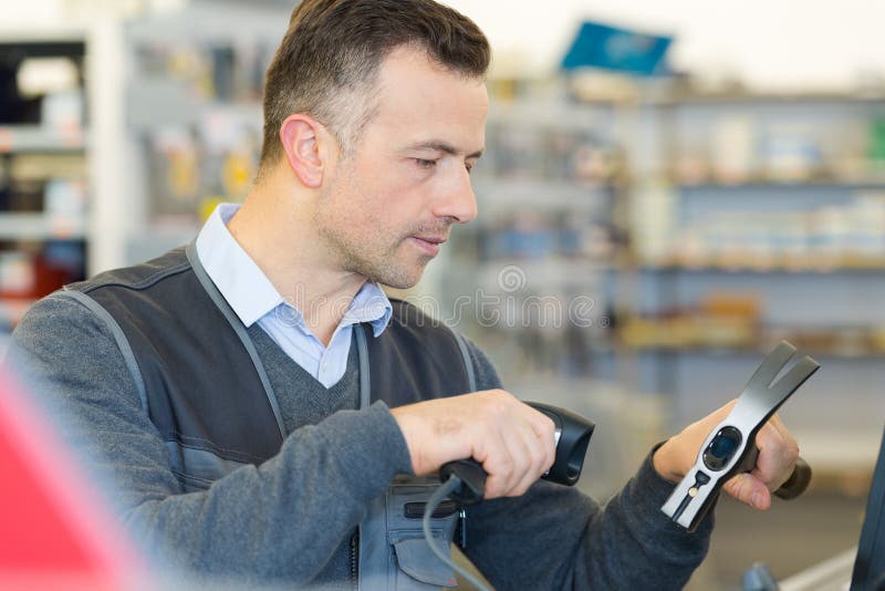 Hardware Worker Scanning Hammer Stock Image - Image of equipment ...