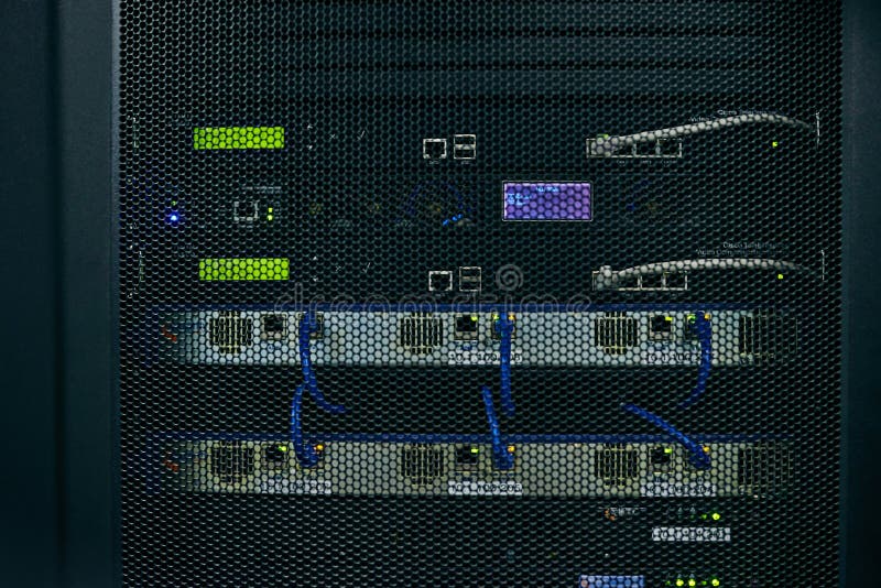 Hardwired To Keep You Connected. a Computer and Cables in a Data Center ...