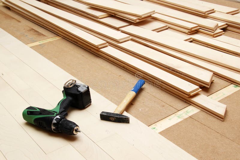 Hardwood flooring stock image. Image of hammer, flooring - 41697683