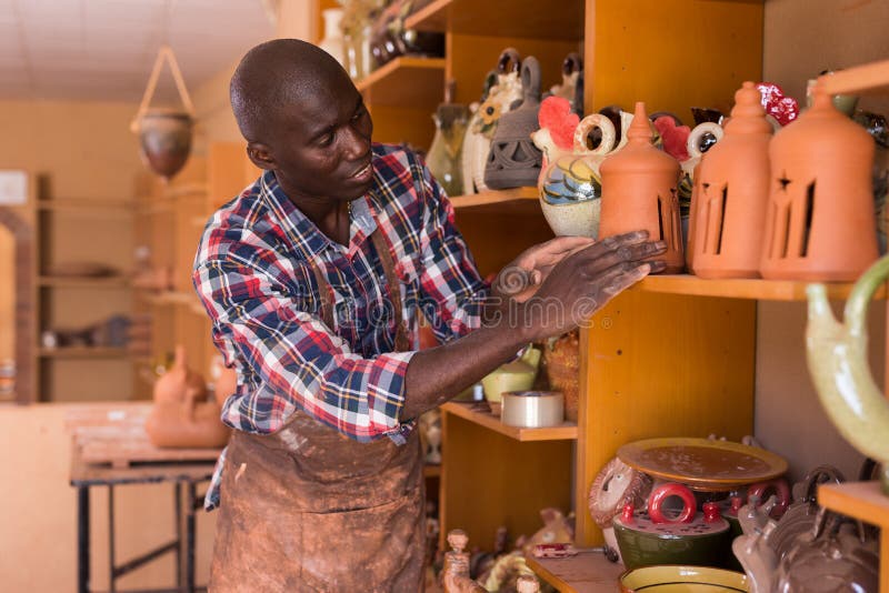 Potter Looking at Clay Dishware Stock Photo - Image of craftsperson ...