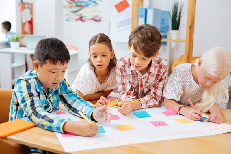 Hardworking Kids Preparing an Extra Task for a Lesson Stock Image ...