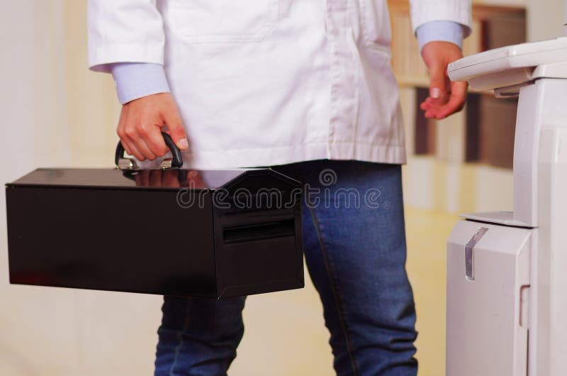 Hardworking Man Holding a Black Tool Box Stock Photo - Image of ...