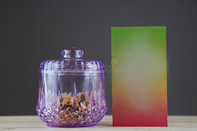 Hari Raya Envelope with Biscuits at Wooden Table Stock Image - Image of ...