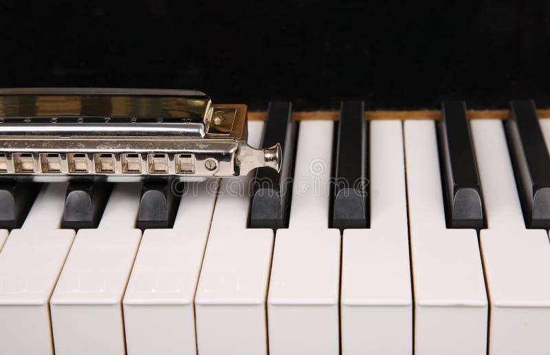 Harmonica and piano stock photo. Image of octave, mouthorgan - 37031162