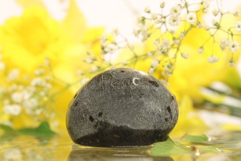 Harmonious Stone Engraved with Peace Stock Image - Image of yellow ...