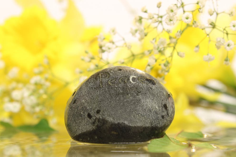 Harmonious Stone Engraved with Peace Stock Image - Image of yellow ...