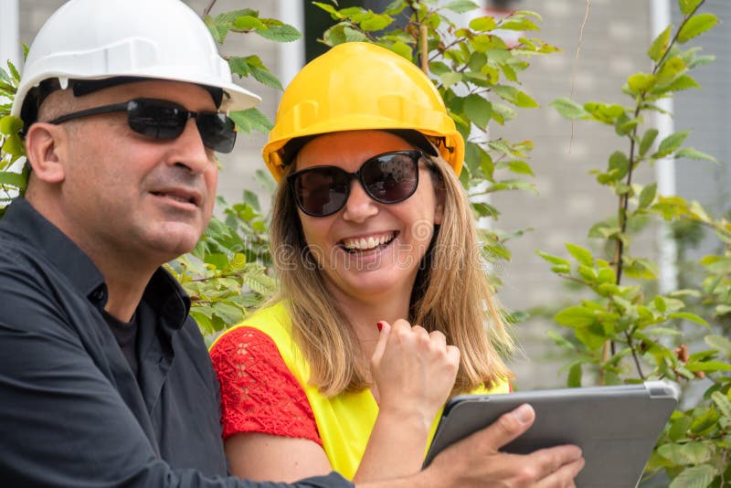 Man and woman engineers stock image. Image of colleagues - 155293459