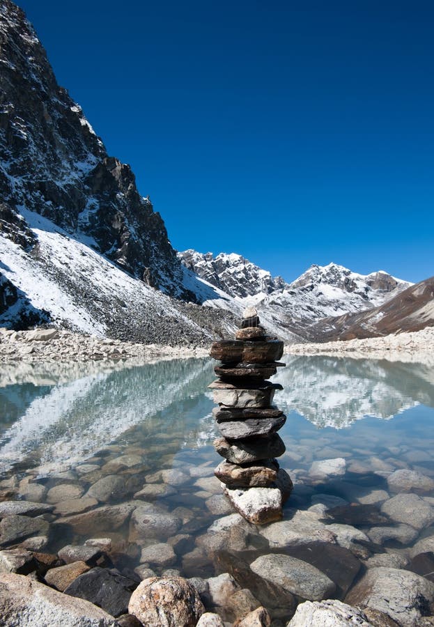 Harmony: Stone Stack and Sacred Lake Near Gokyo Stock Image - Image of ...