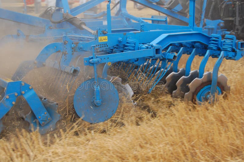 Harrowing by discs stock image. Image of iron, soil, farm - 15595829