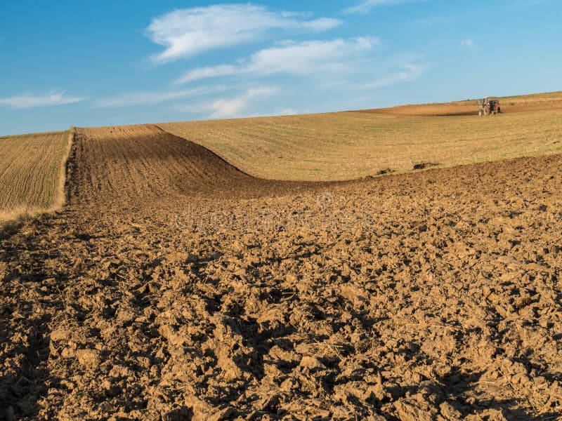 Harrowing a field stock photo. Image of rural, nature - 19784256