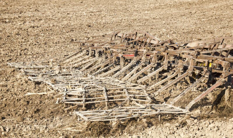 Harrowing the Soil with Tine Harrows Stock Photo - Image of land ...