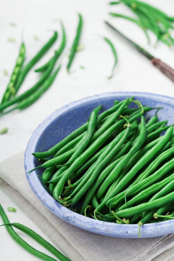 Harvest of Green or String Beans in Rustic Bowl on White Table. Organic ...