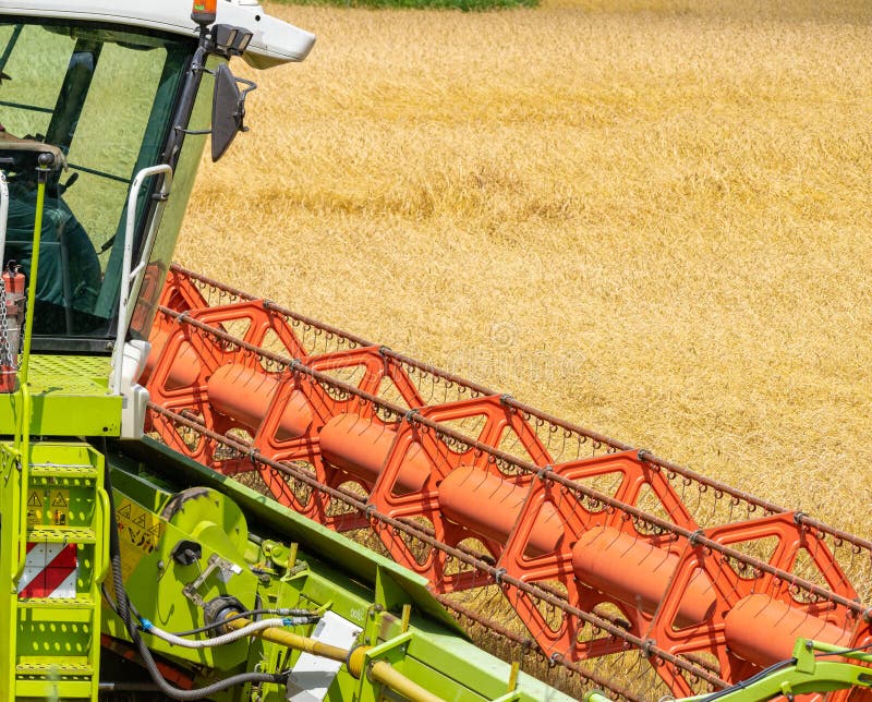 Harvester at work stock photo. Image of agricultural - 154467116